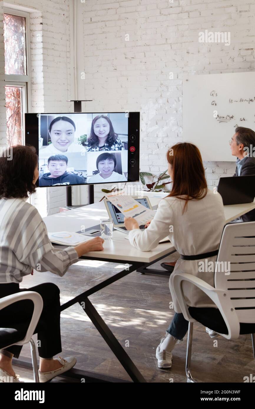 Business team in the conference room open video conference Stock Photo ...