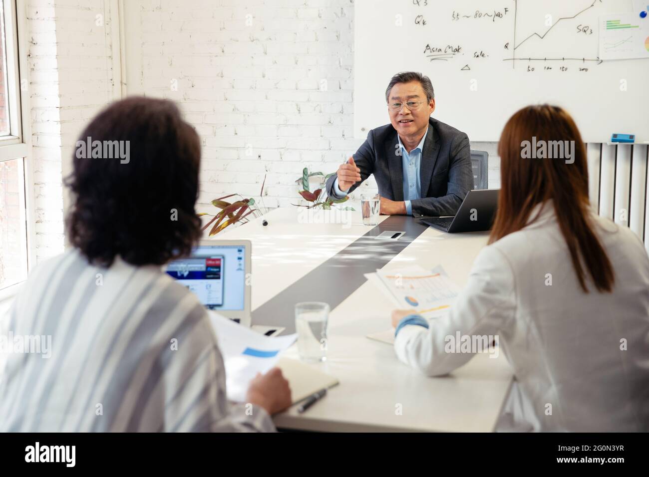 Business people in the meeting room Stock Photo - Alamy