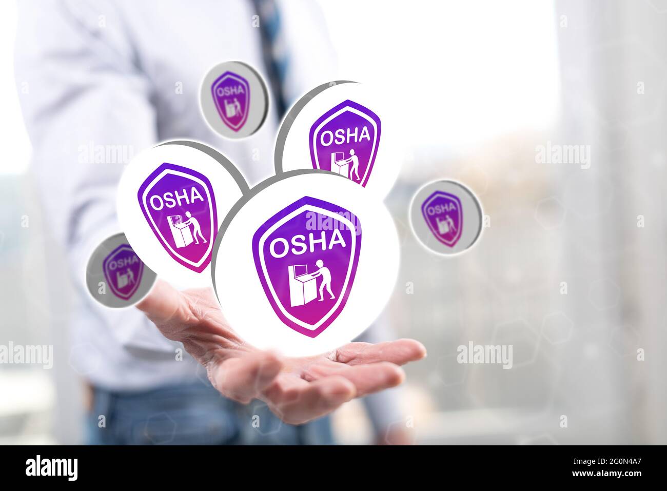 Osha concept above the hand of a man in background Stock Photo - Alamy