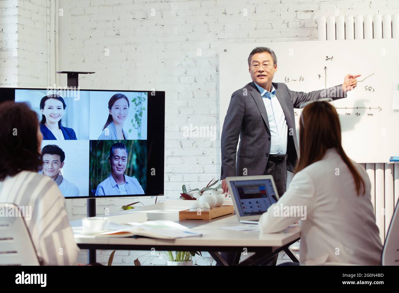 Business team in the conference room open video conference Stock Photo ...