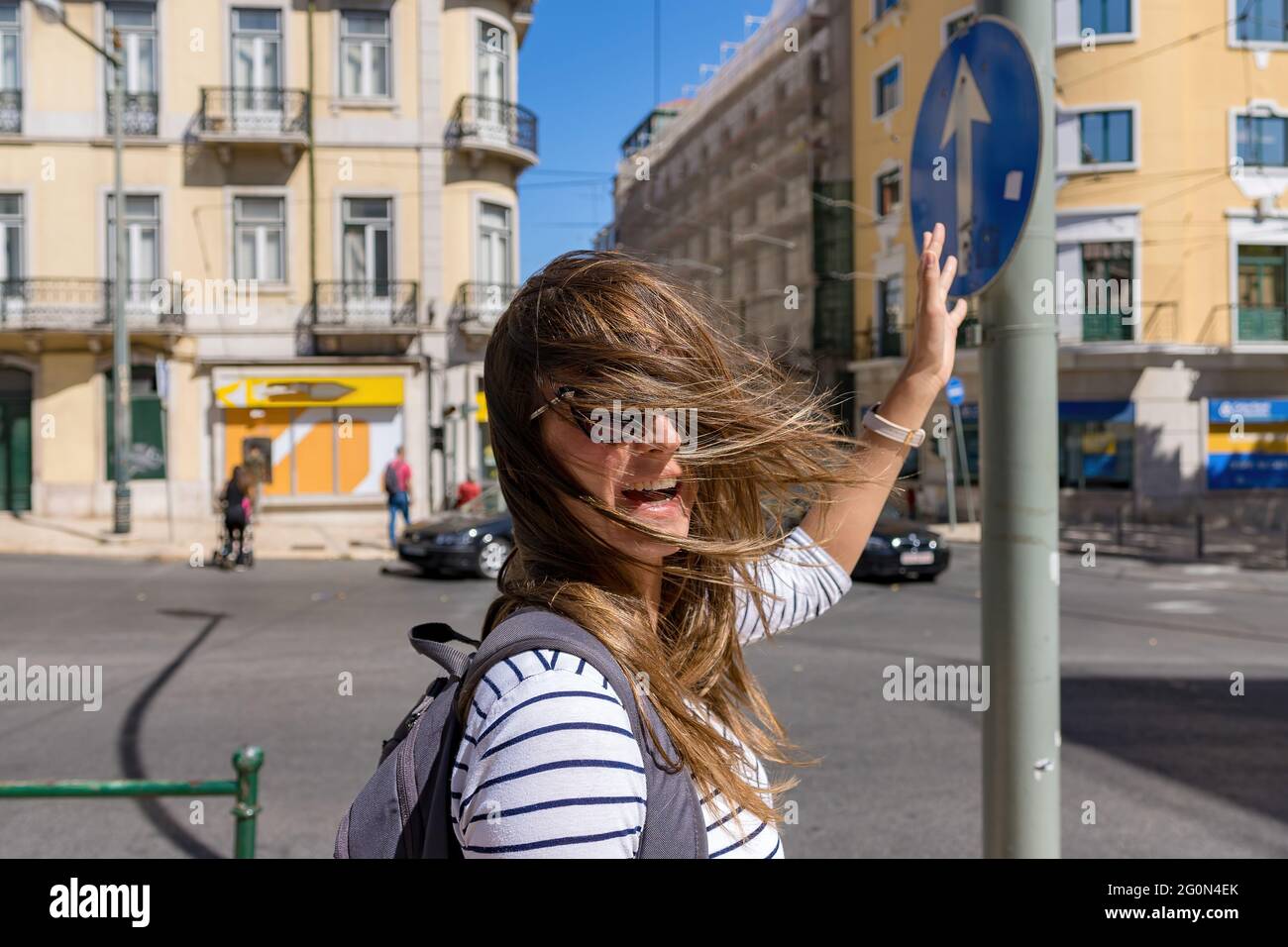 Strong wind blowing woman hi-res stock photography and images - Alamy
