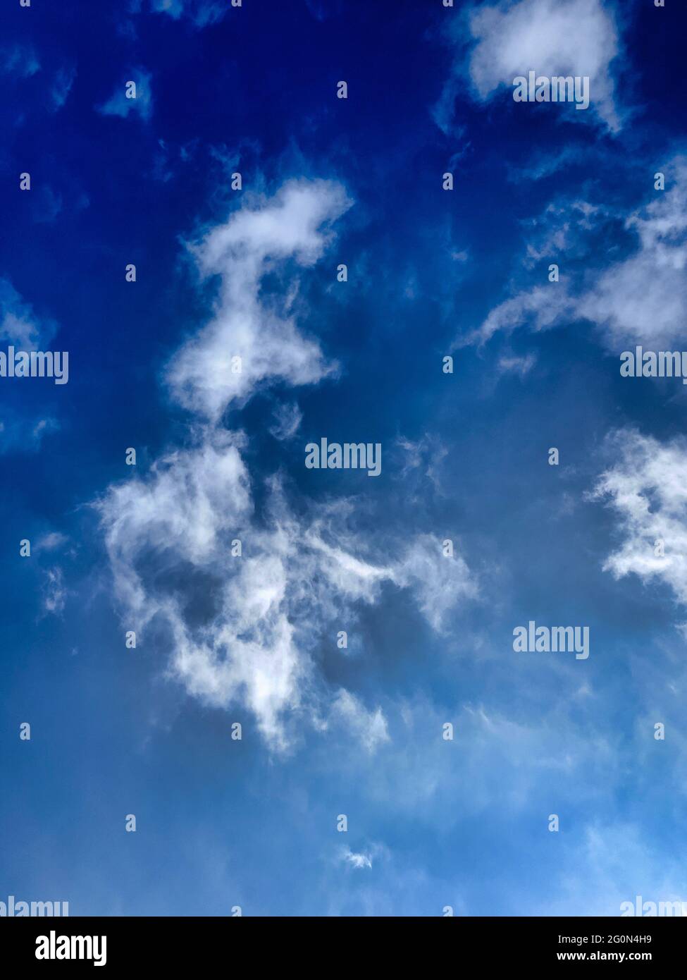 Blue Sky and clouds in dreamy setting Stock Photo - Alamy