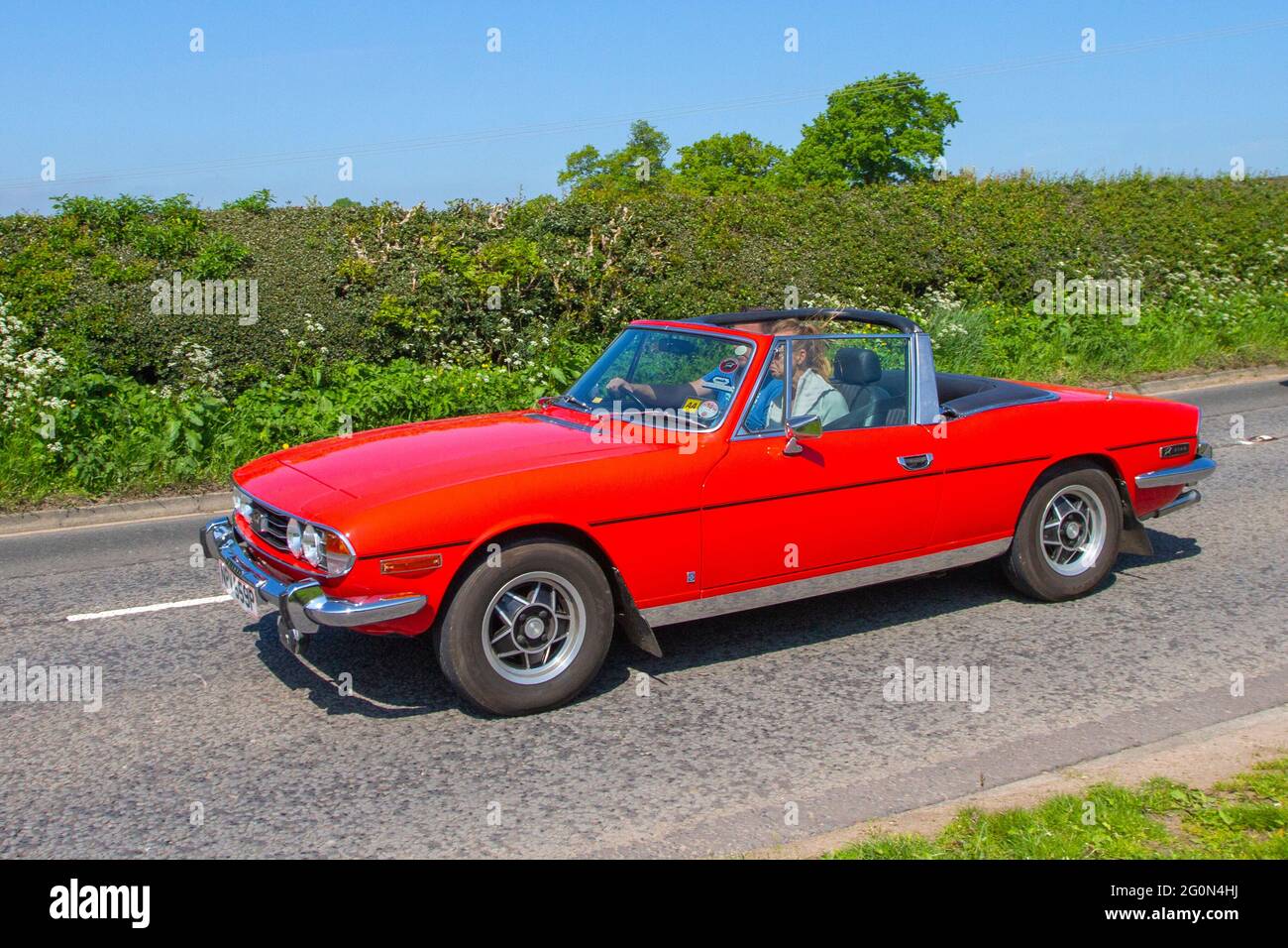 1972 70s Red Triumph Stag Mk2, driving on country roads en-route to ...