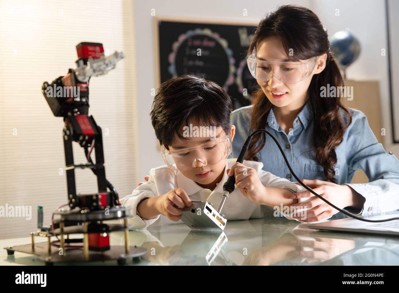 The teacher taught the pupils learning robot programming Stock Photo ...