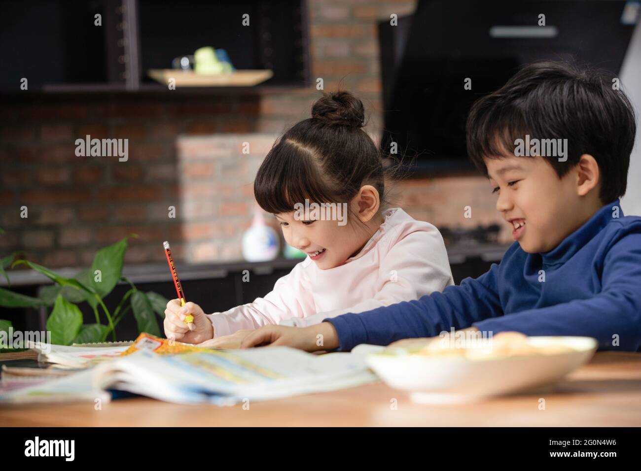 Homework asia hi-res stock photography and images - Alamy