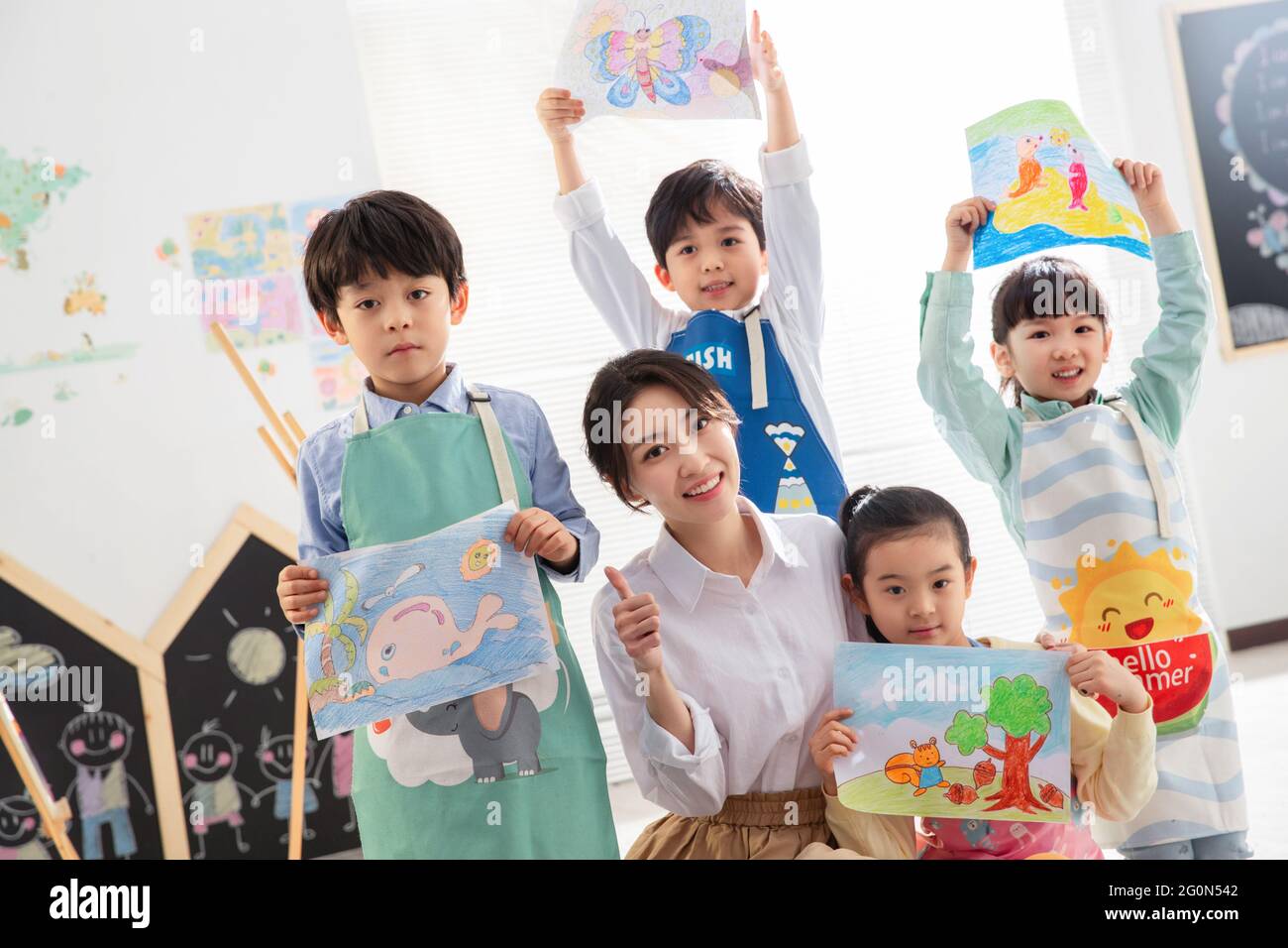 Happy children's art class took a trip Stock Photo - Alamy
