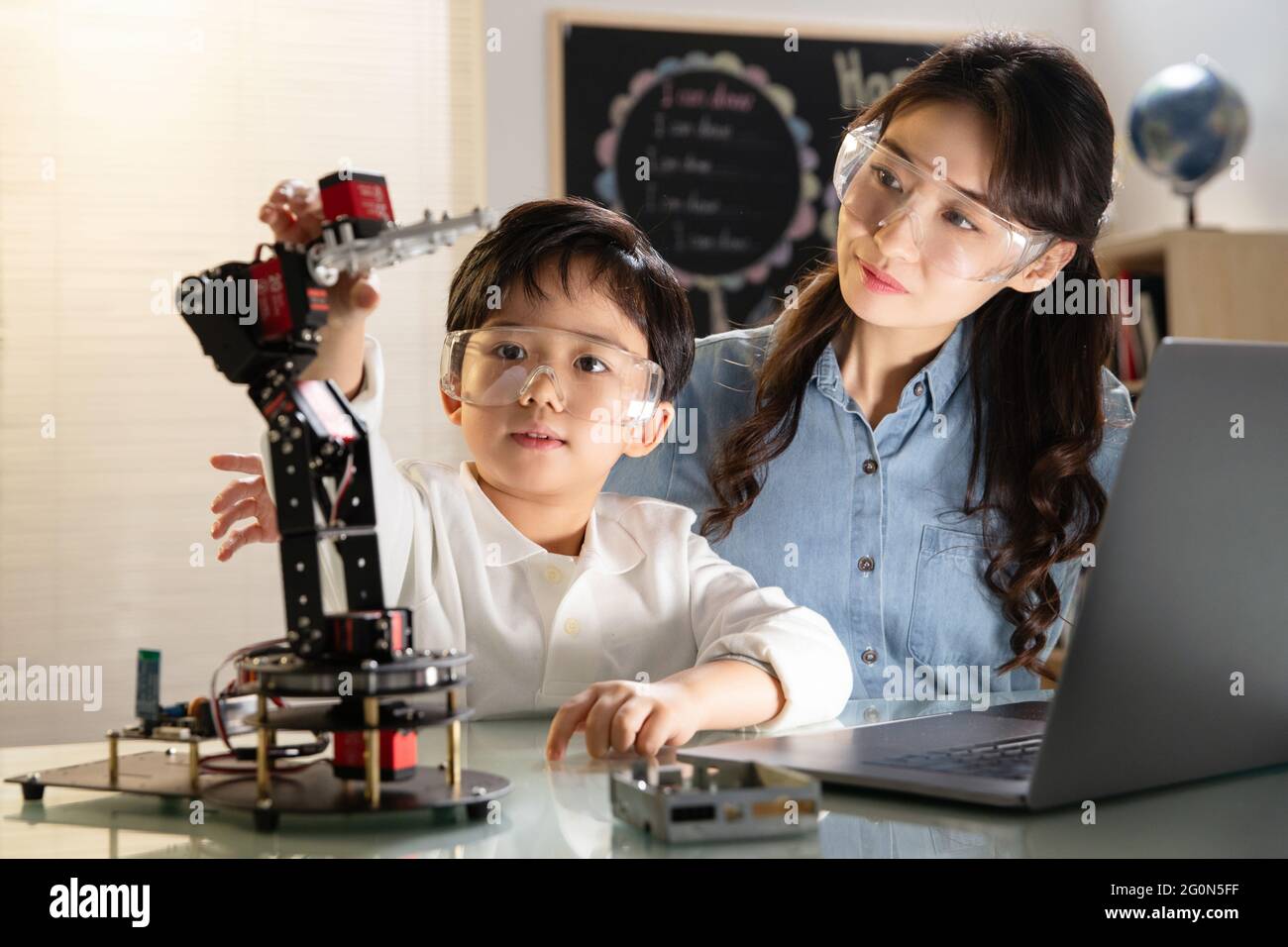 The teacher taught the pupils learning robot programming Stock Photo ...