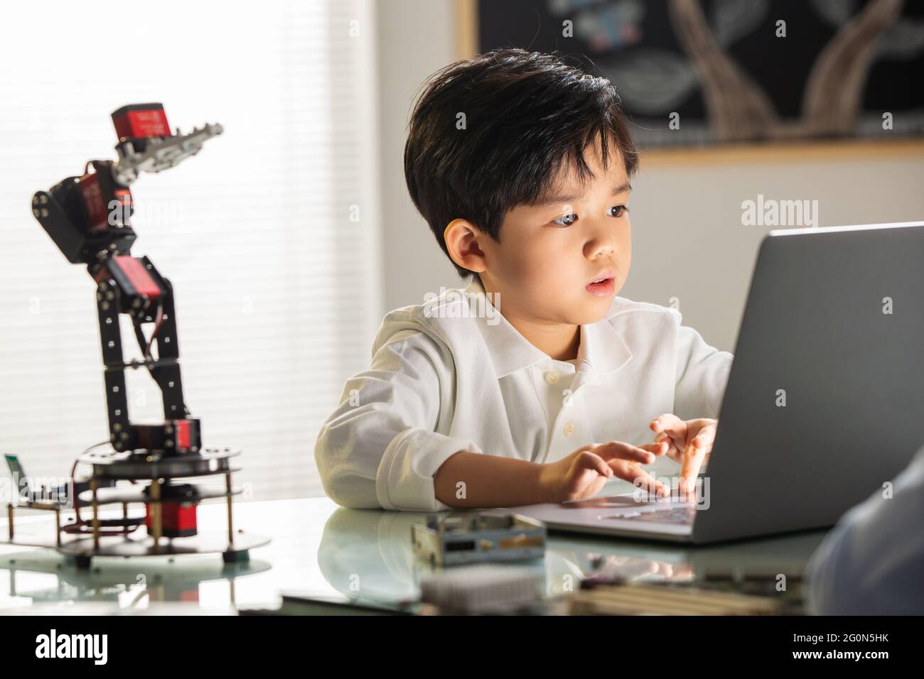 Students learning robot programming Stock Photo - Alamy