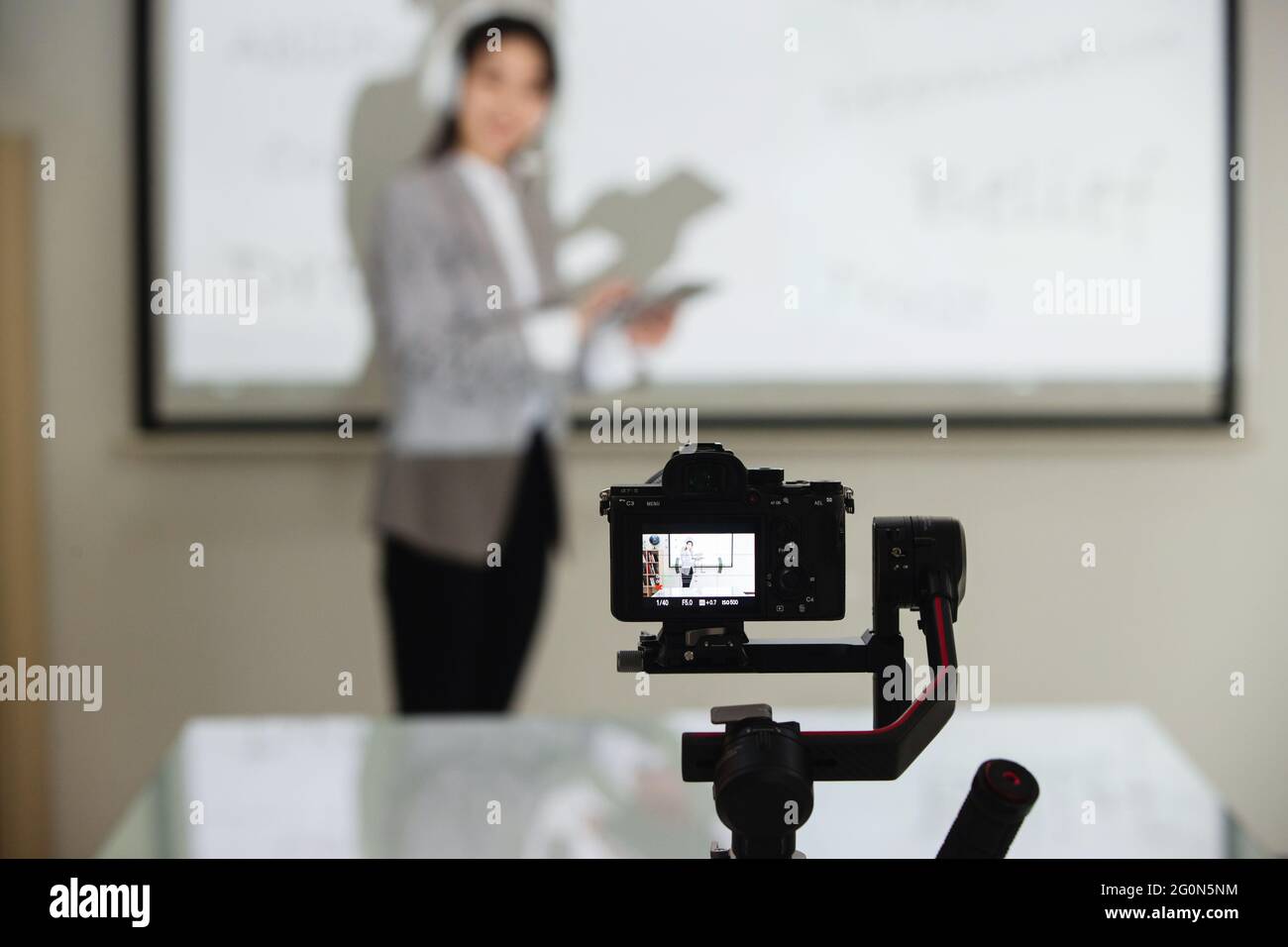 Live online course of young women teachers Stock Photo - Alamy