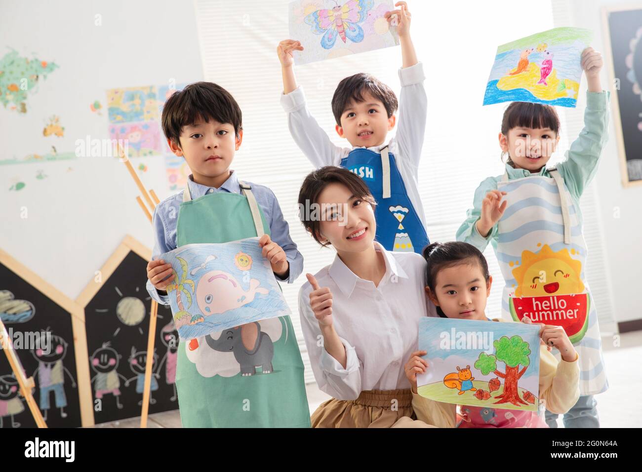 Happy children's art class took a trip Stock Photo - Alamy