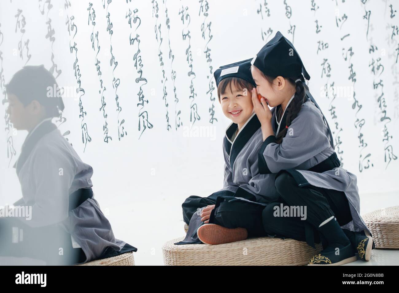 Classroom students talking whisper hi-res stock photography and images ...