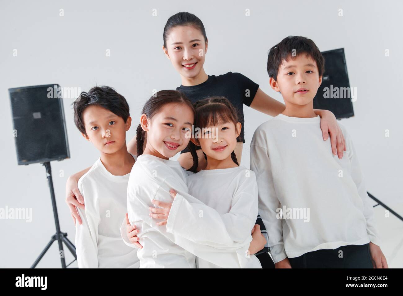 Happy pupils learn how to dance Stock Photo - Alamy