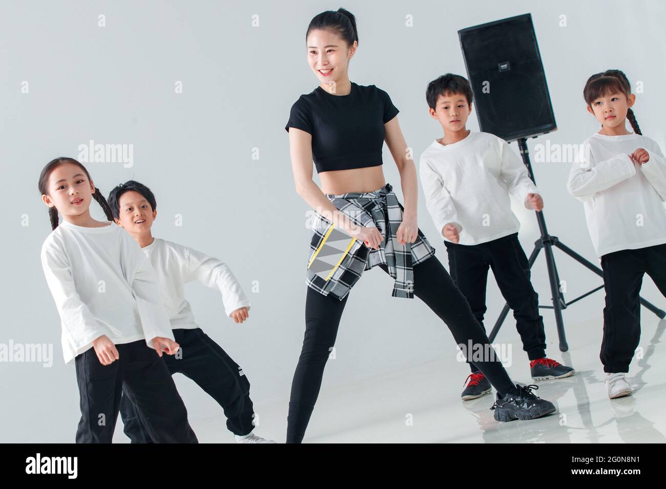 Youth dance teacher to teach the children learn how to dance Stock ...