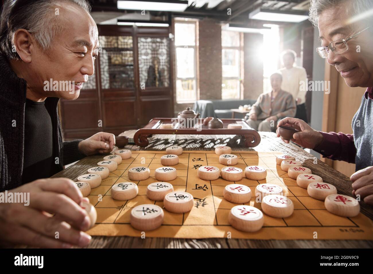 Old friends playing chess Stock Photo - Alamy