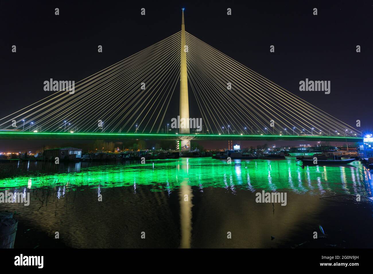 Ada bridge (Most na Adi) and green glow over Sava river and small ...