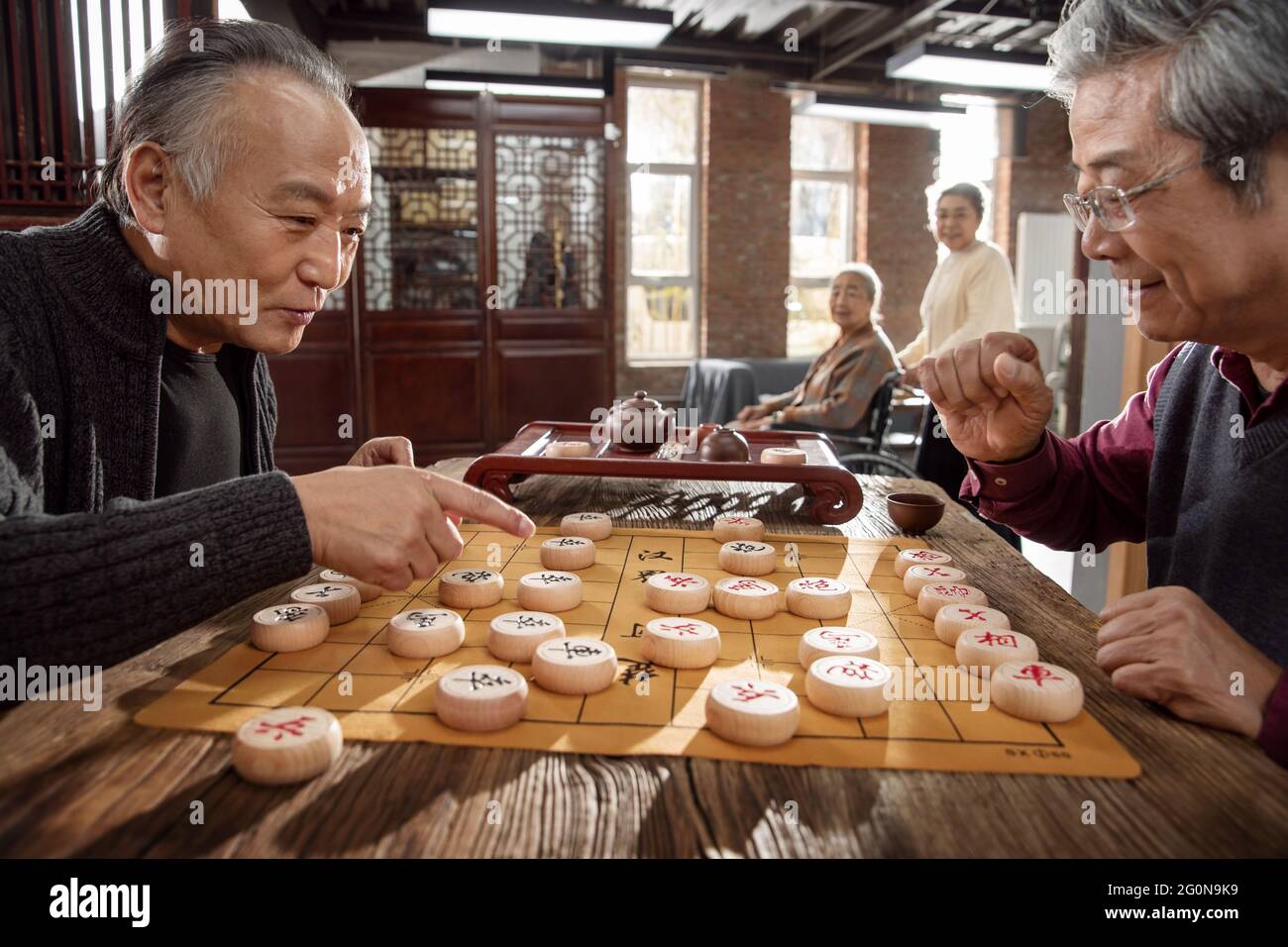 Old friends playing chess Stock Photo - Alamy