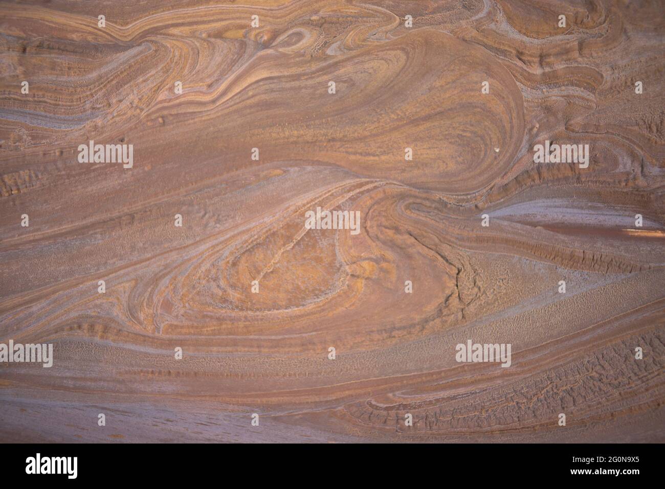 chocolate paste chilling on a table, stone shaped mexican artisan ...