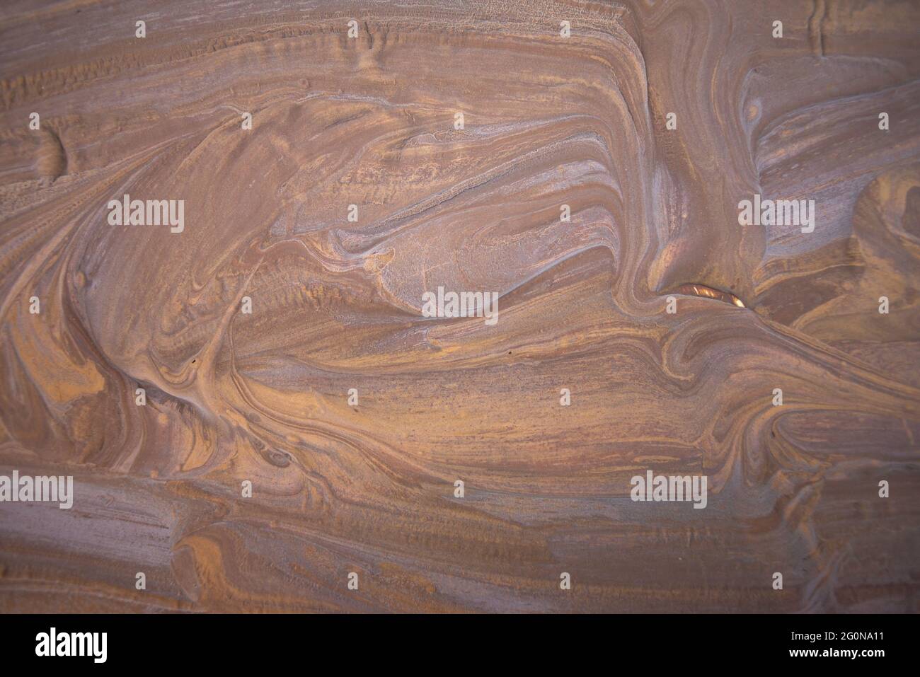 chocolate paste chilling on a table, stone shaped mexican artisan ...