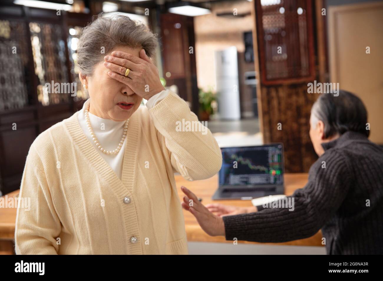 Older couples with a computer check of the stock market Stock Photo - Alamy