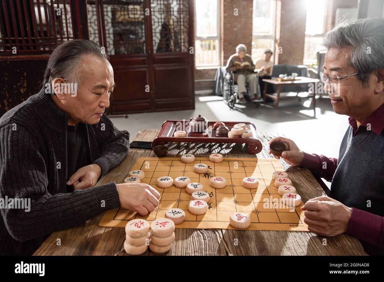Old friends playing chess Stock Photo - Alamy