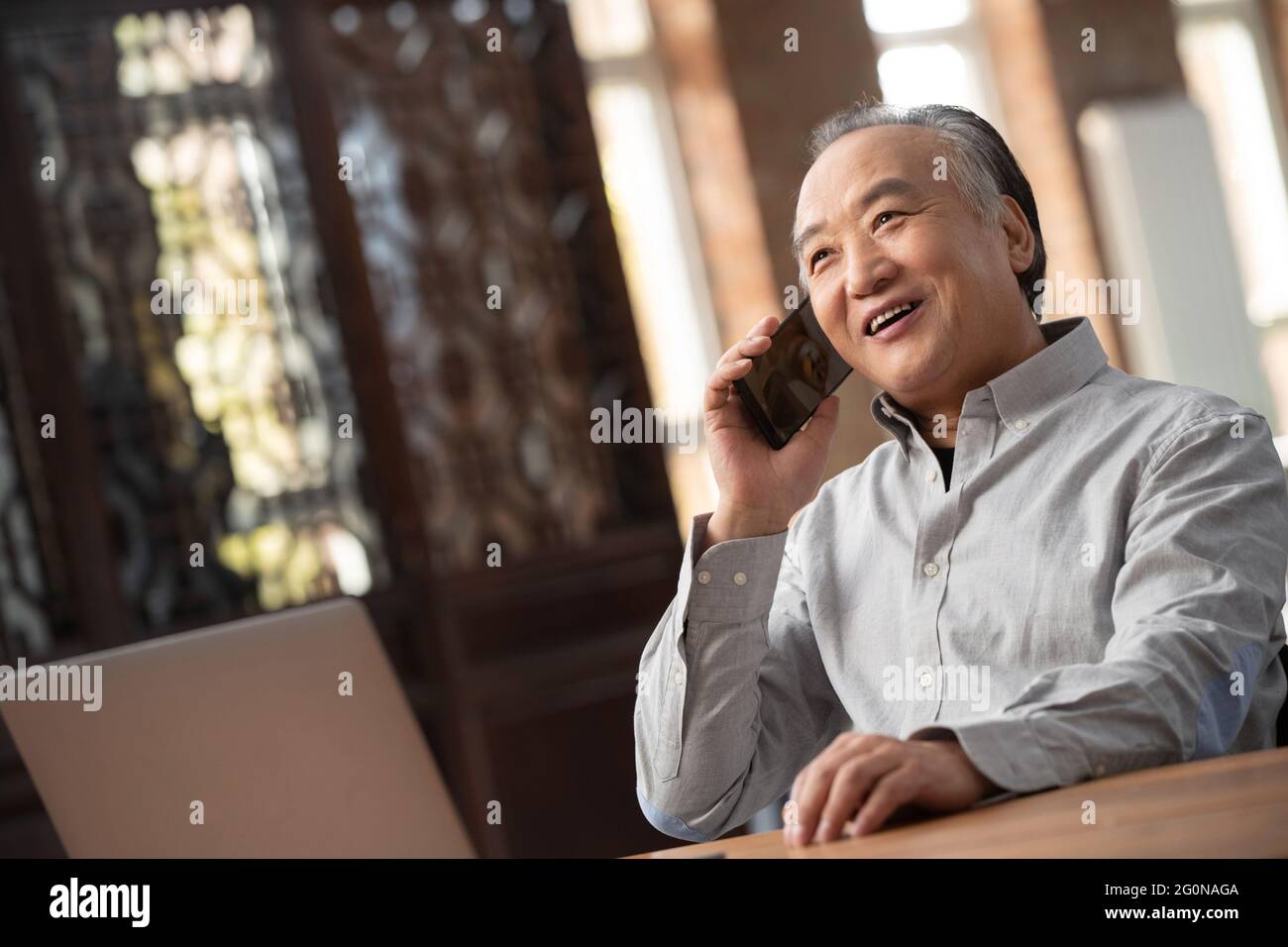 The elderly using a mobile phone call Stock Photo - Alamy