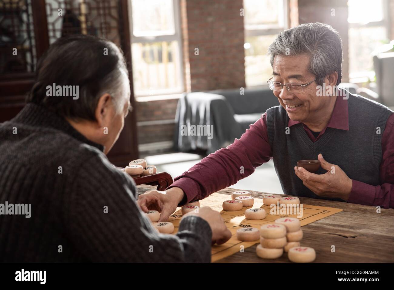 Old friends playing chess Stock Photo - Alamy