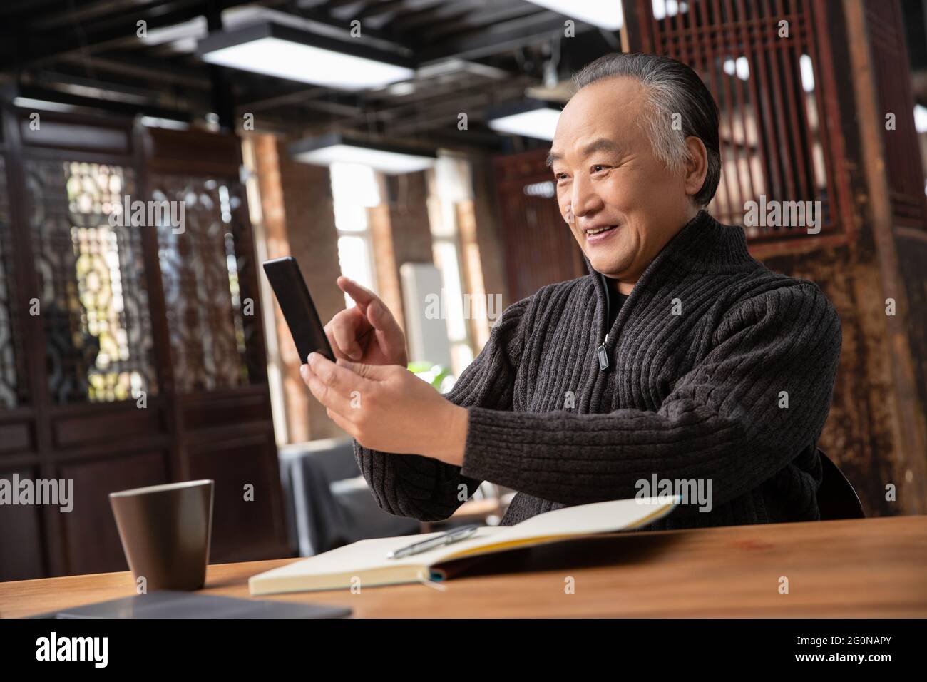 The elderly using a mobile phone call Stock Photo - Alamy
