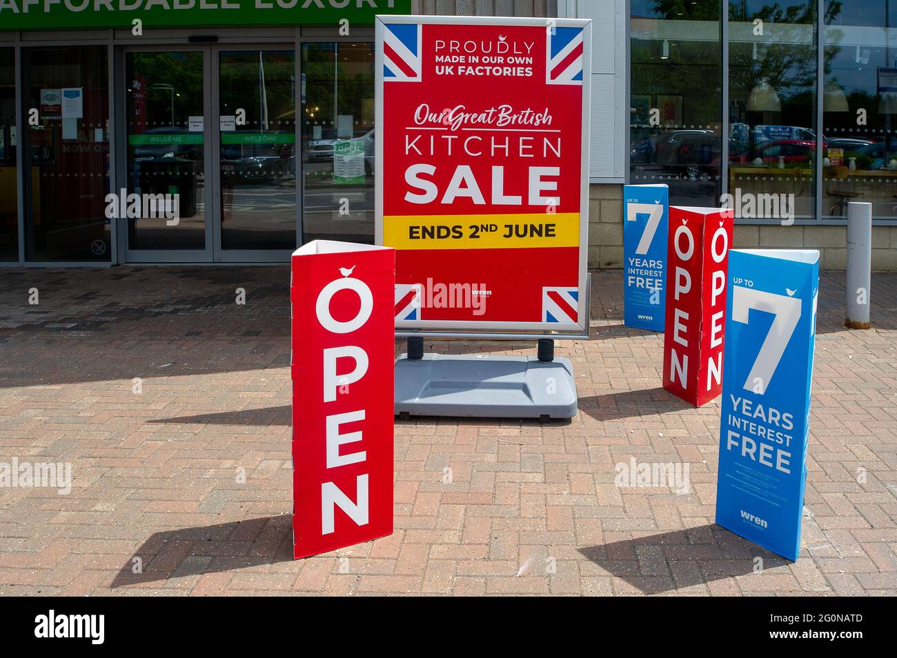 Slough, Berkshire, UK. 2nd June, 2021. A colourful sale sign outside a ...