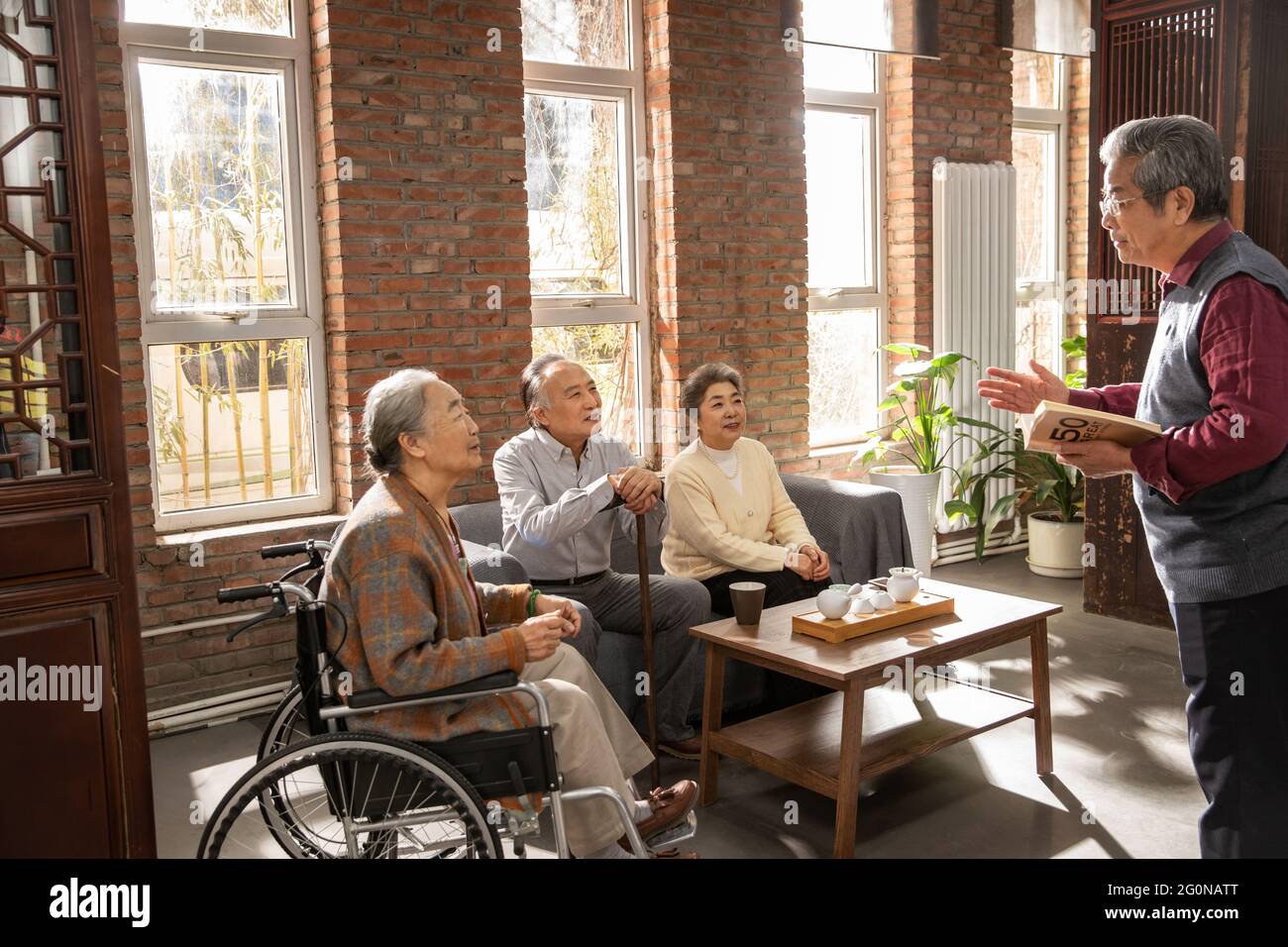 Happy old people come together to chat Stock Photo - Alamy