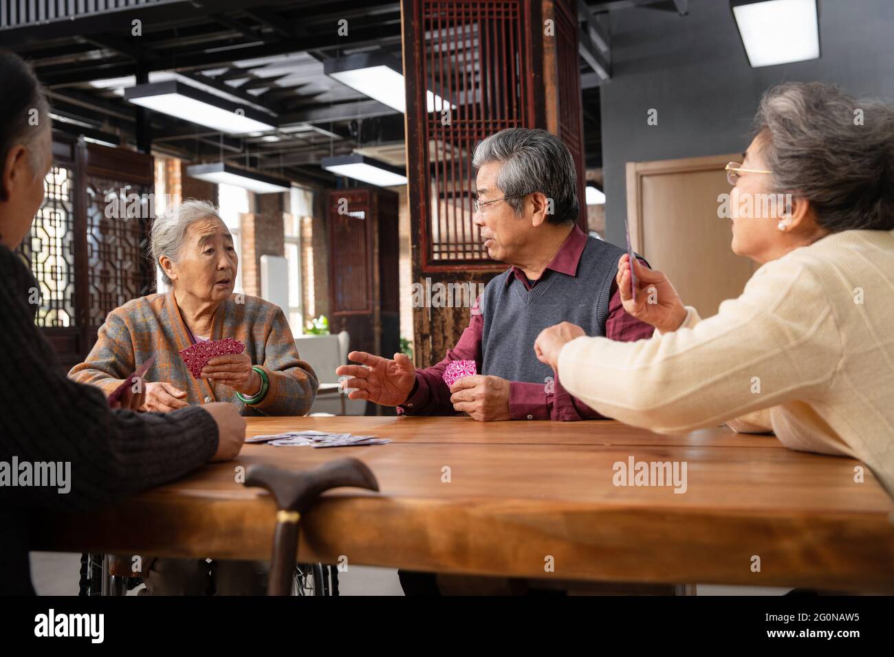 Old friends playing CARDS Stock Photo - Alamy