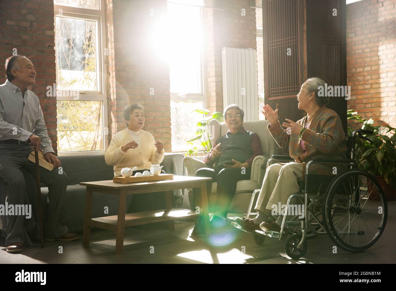 Happy old people come together to chat Stock Photo - Alamy