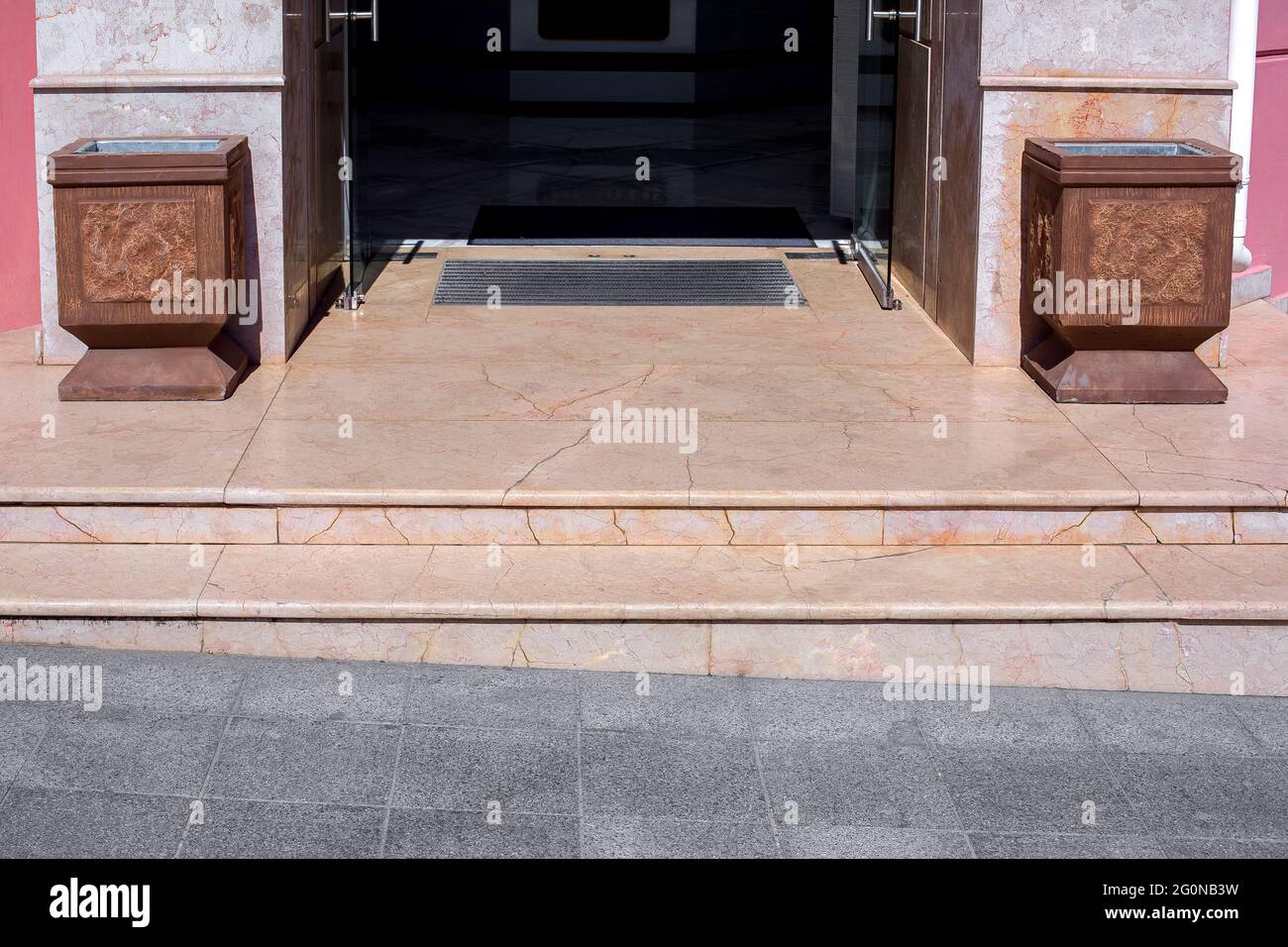 granite threshold with steps at the entrance to the store with a foot ...