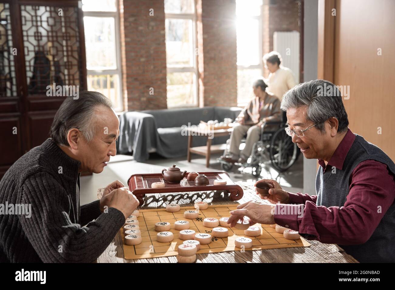 Old friends playing chess Stock Photo - Alamy