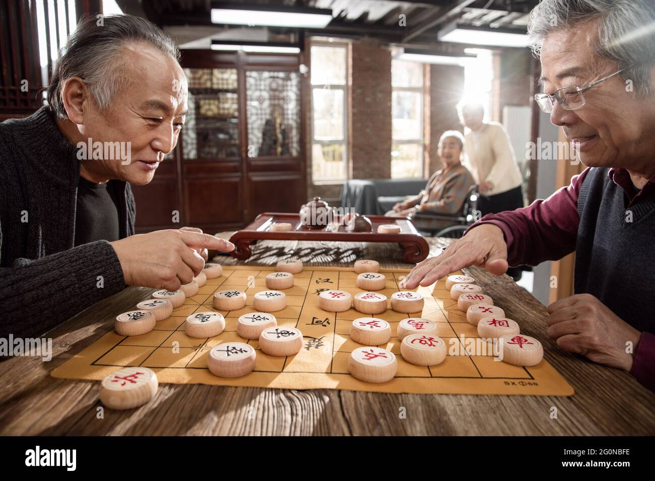 Old friends playing chess Stock Photo - Alamy