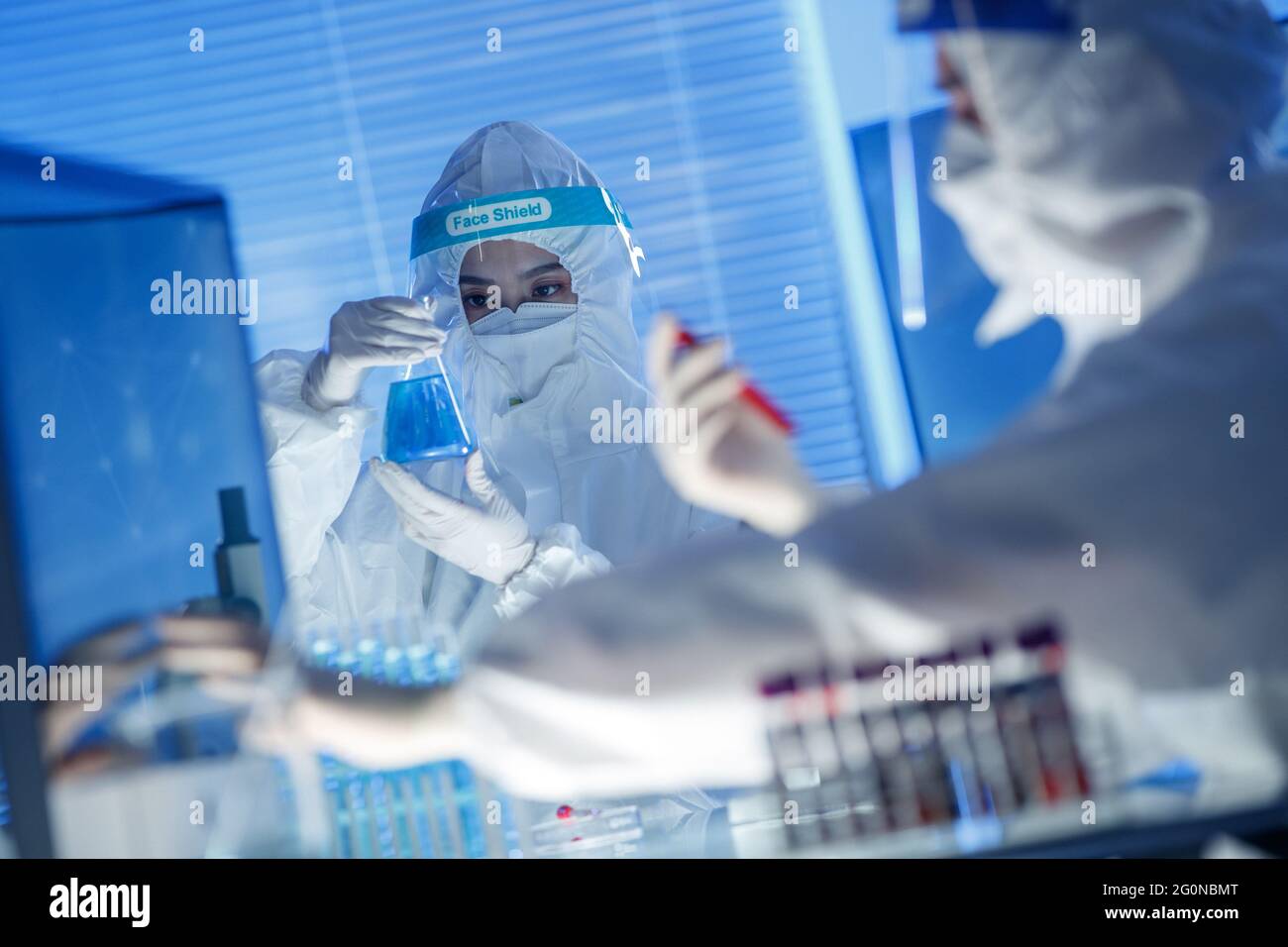 Medical workers do medical experiments Stock Photo - Alamy