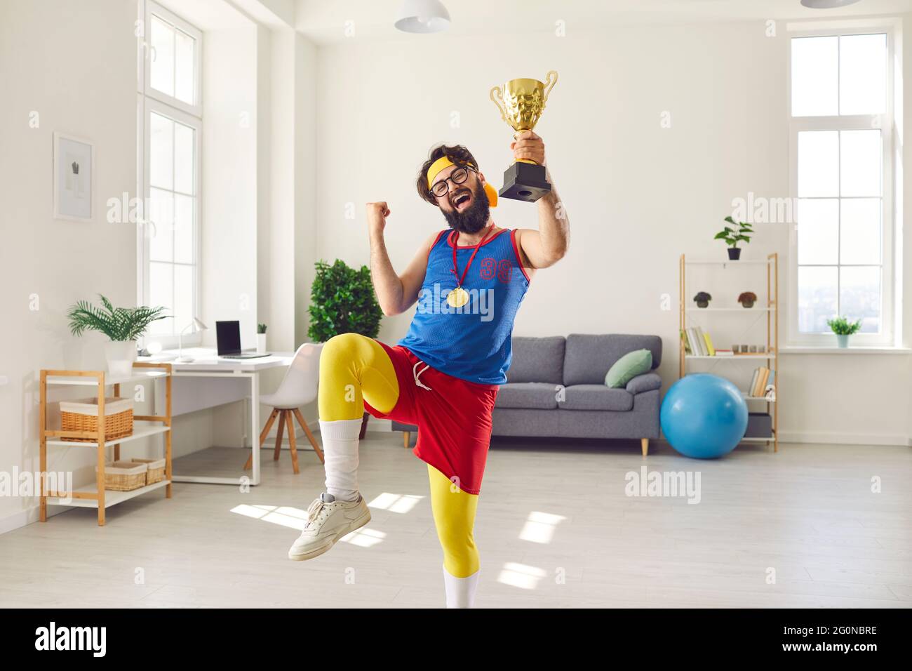 Man winning trophy hi-res stock photography and images - Alamy