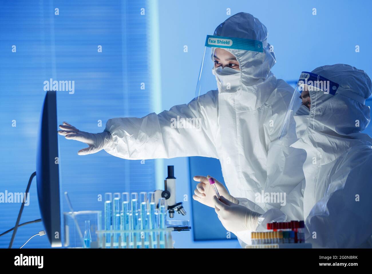 Medical workers do medical experiments Stock Photo - Alamy