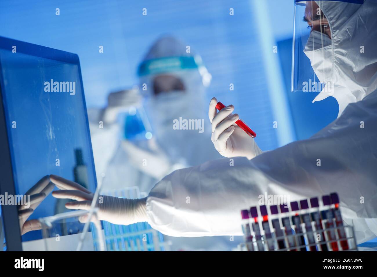Medical workers do medical experiments Stock Photo - Alamy