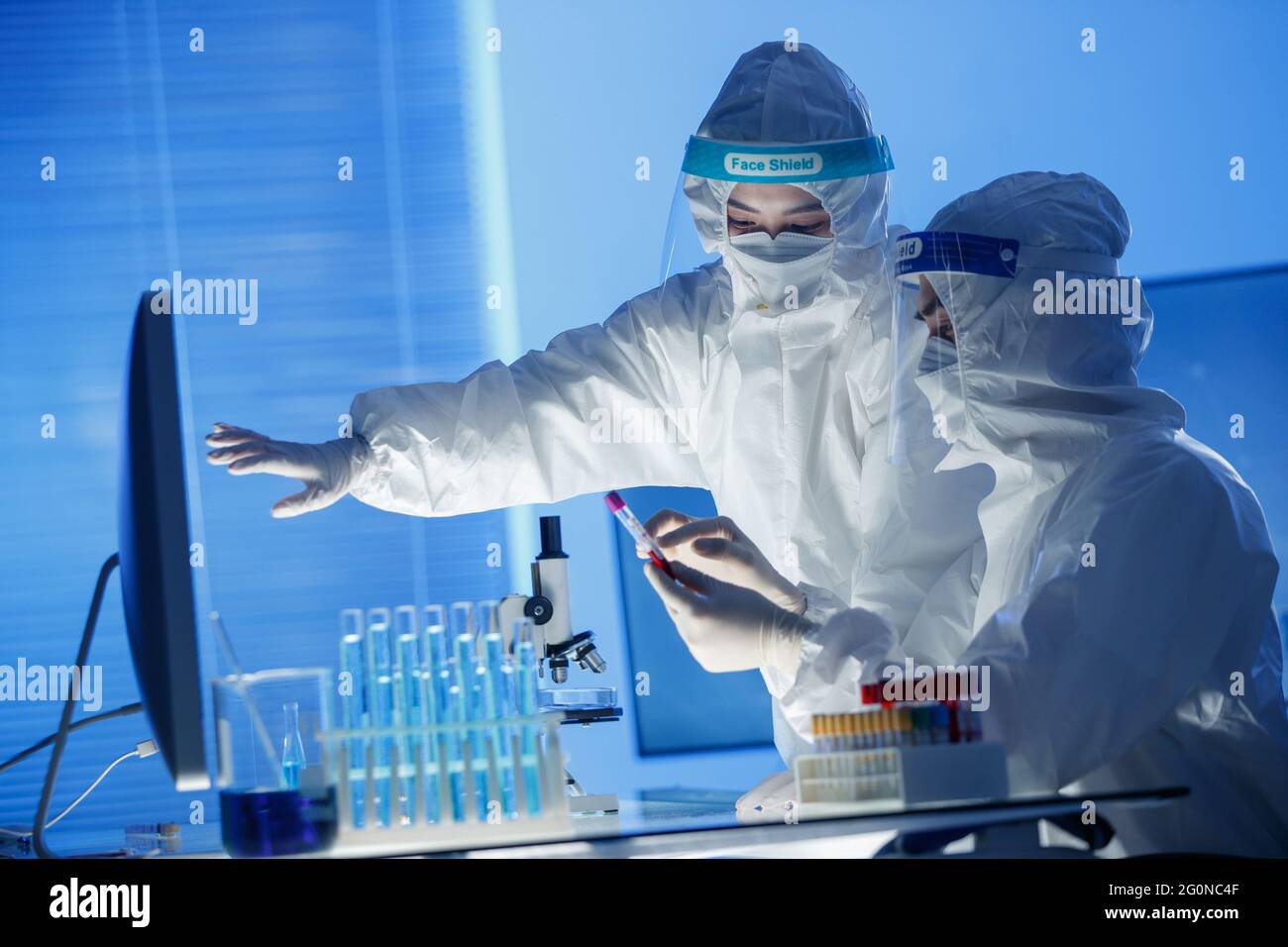 Medical workers do medical experiments Stock Photo - Alamy