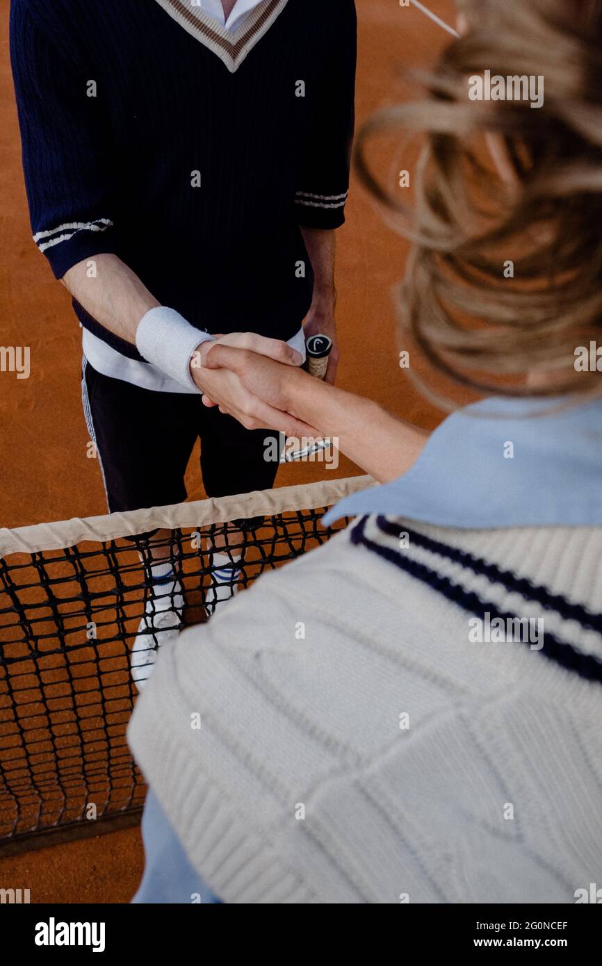 Congratulating hand shake hi-res stock photography and images - Alamy