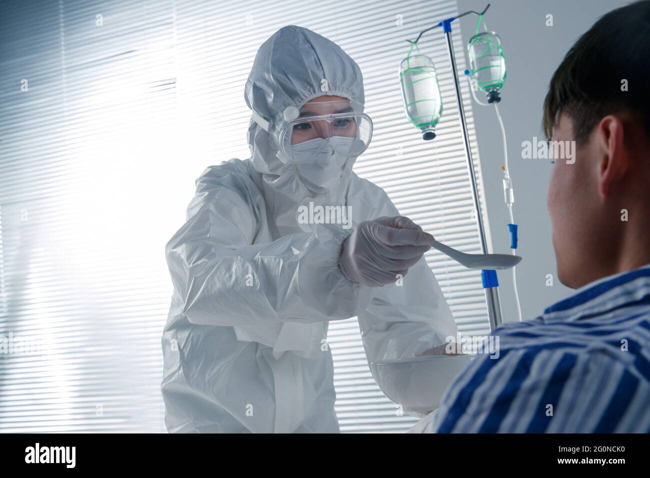 Hospital patient eating dinner hi-res stock photography and images - Alamy