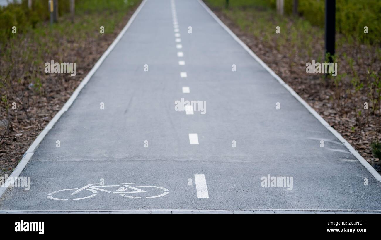 Bicycle path road sign on city street Stock Photo - Alamy