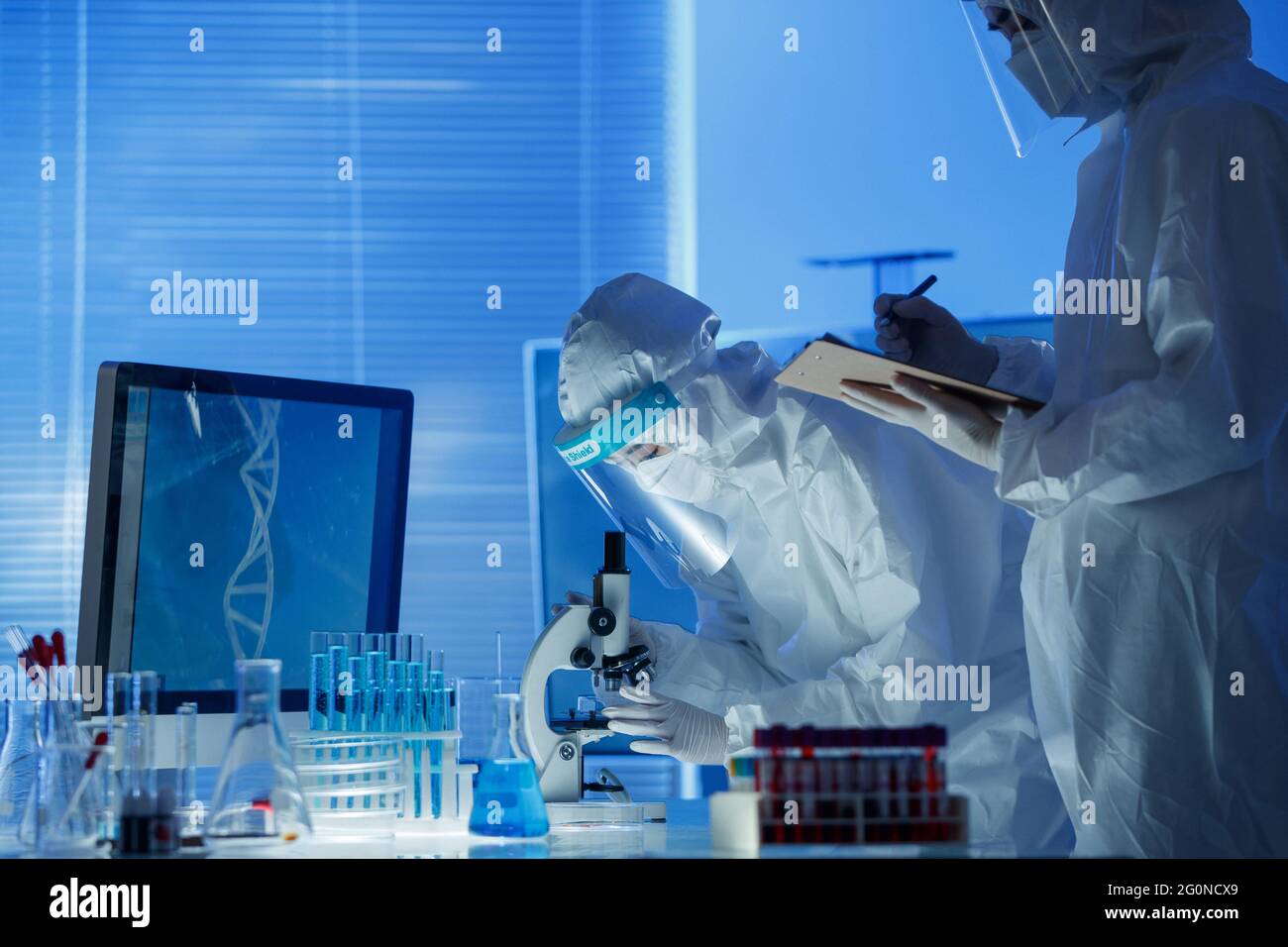 Medical workers do medical experiments Stock Photo - Alamy