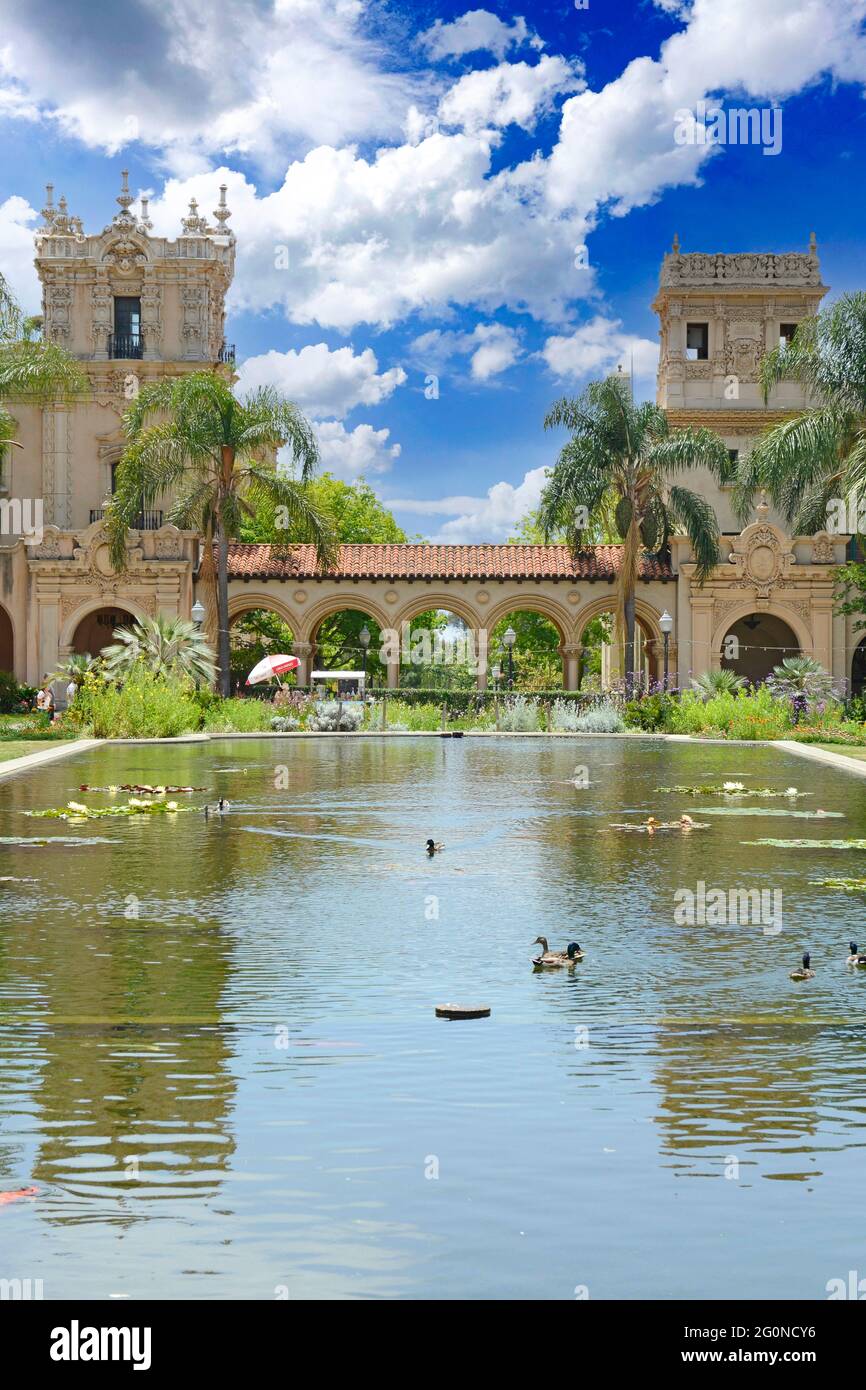 People at the Lagoon and the covered walkway on El Prado in Balboa Park ...