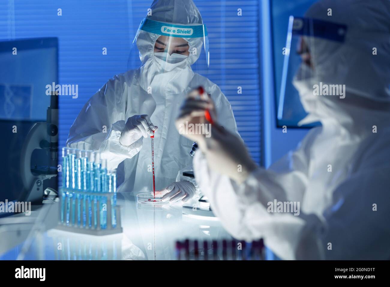 Medical workers do medical experiments Stock Photo - Alamy