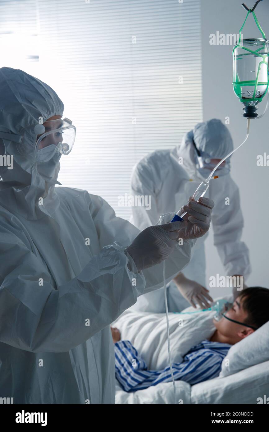 Nurses in the ward to debug the physiological saline Stock Photo - Alamy