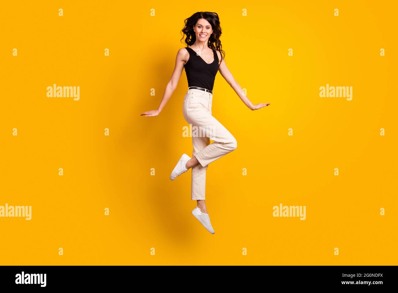 Full length body size photo of funny woman jumping up gracefully ...