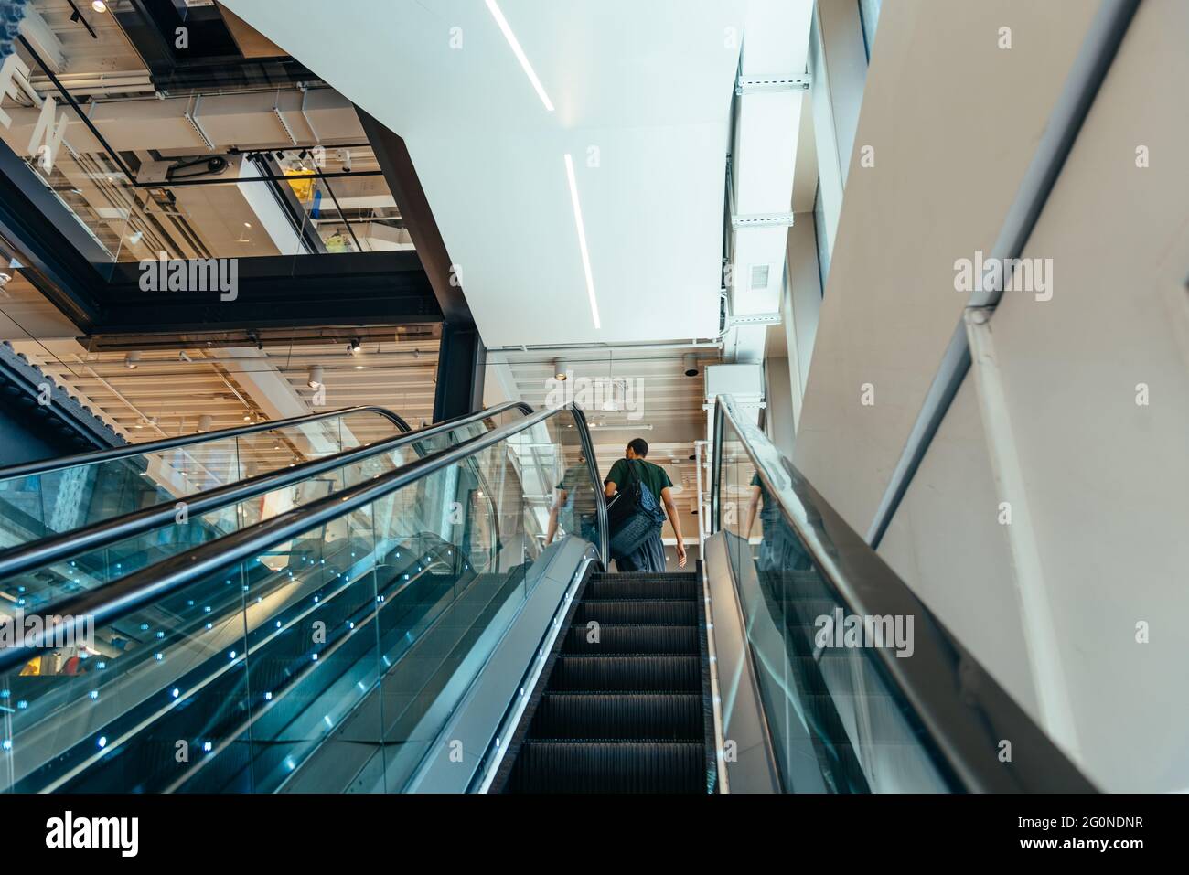 Modern luxury escalators at shopping mall. Low angle view Stock Photo - Alamy