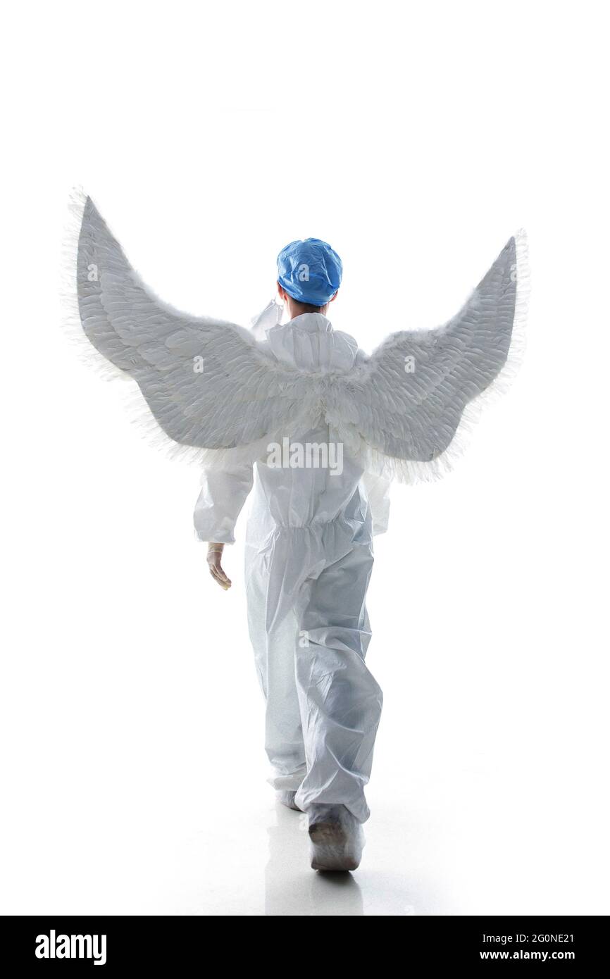 Busy angel back Stock Photo - Alamy