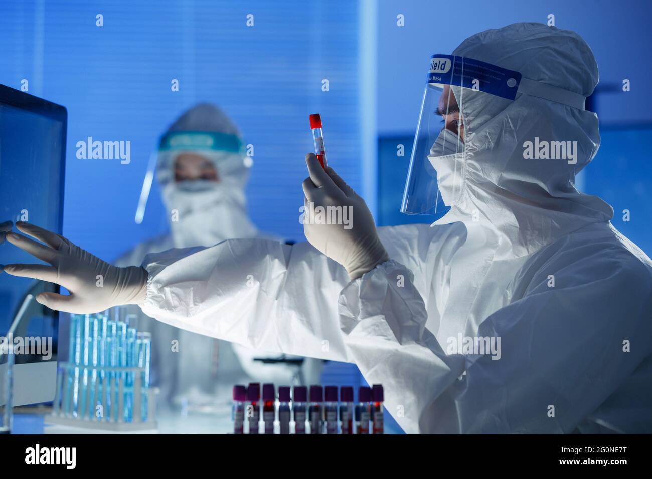 Medical workers do medical experiments Stock Photo - Alamy